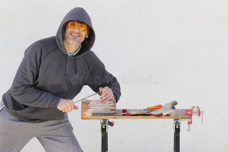 Man with file stock image. Image of carver, shape, work - 29901809
