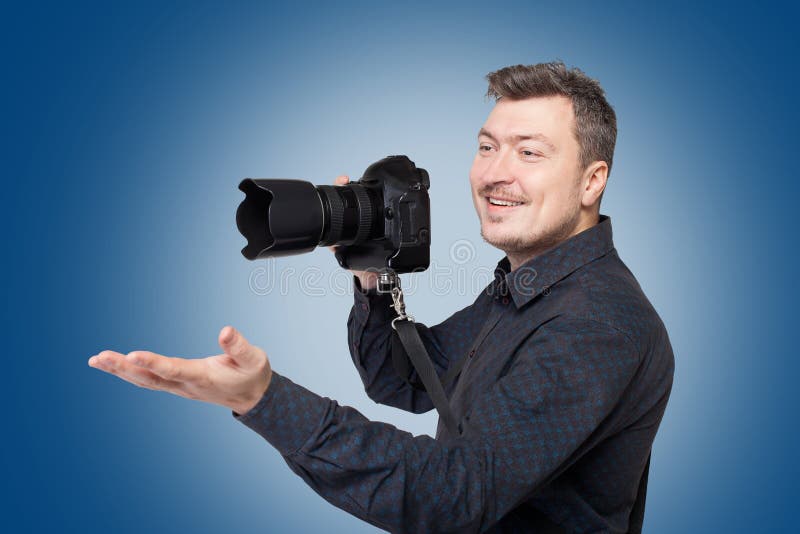 Smiling Man with Professional Digital Camera Stock Image - Image of ...