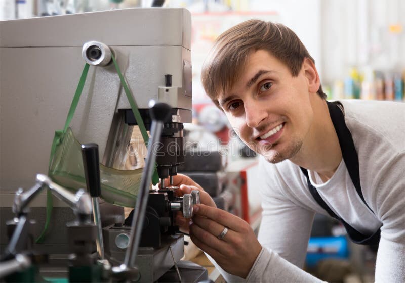Smiling Man Professional Making Key Stock Photo - Image of keymaker ...