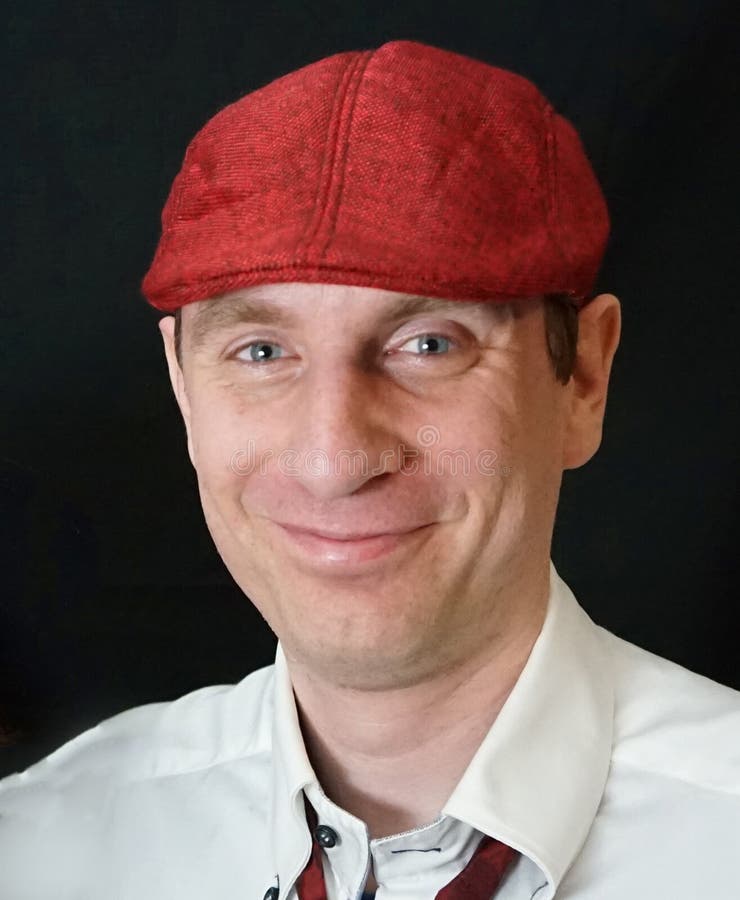 A Smiling Man with a Red Flat Cap Stock Photo - Image of 3539, human ...