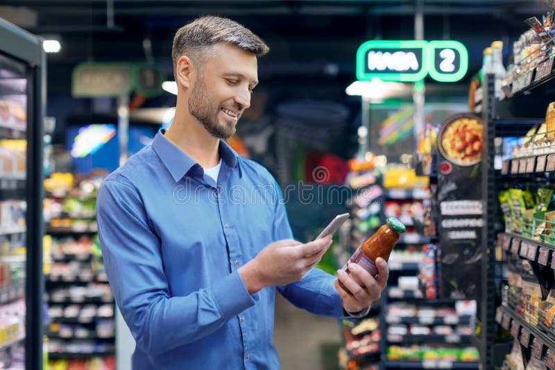 Smiling Man Scanning Qr Code on Glass Jar with Smartphone, Supermarket ...