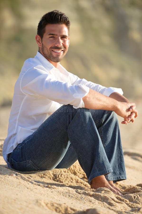 Relalaxed Man Seated on the Sand Stock Photo - Image of paradise ...
