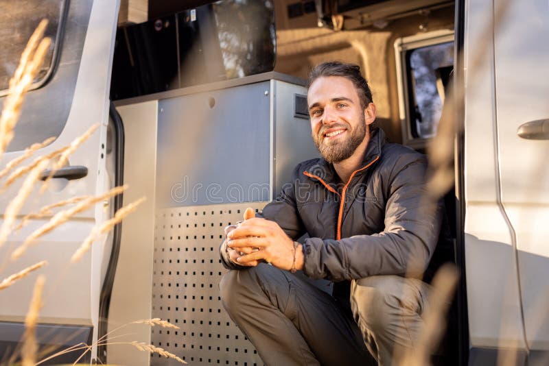 Smiling Man Sitting in His Camper Van Stock Photo - Image of life ...