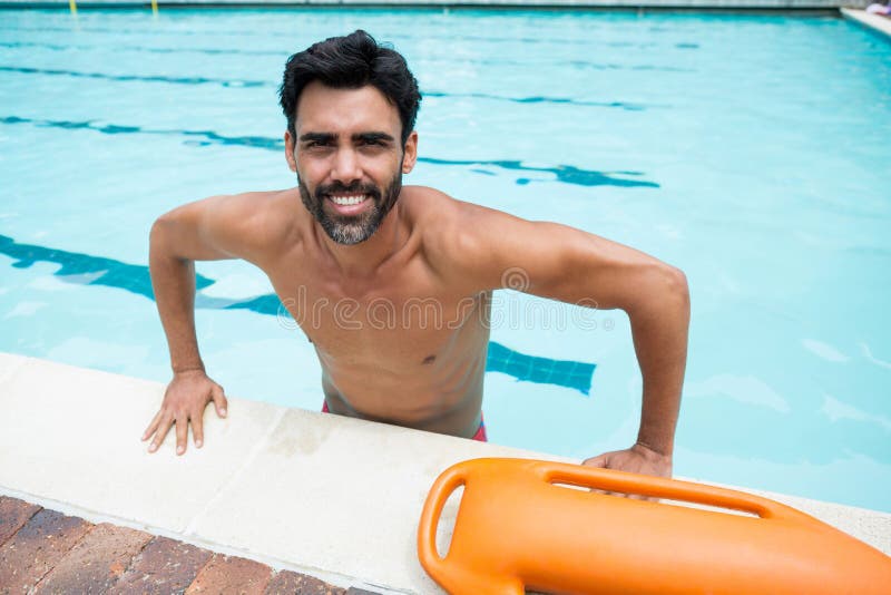 Smiling Man Standing in Swimming Pool Stock Photo - Image of lesson ...