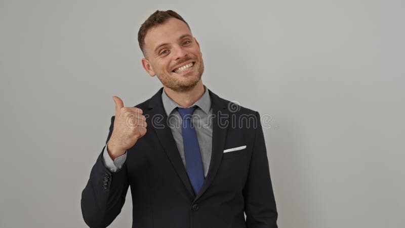 Smiling Man in Suit Giving Thumbs-up Against a White Background Stock ...