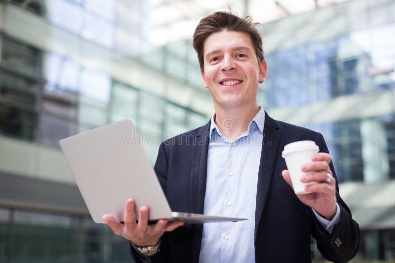 Smiling Man in Suit Working at the Laptop Stock Image - Image of ...