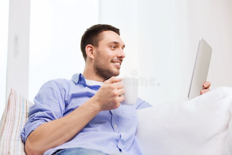 Smiling Man with Tablet Pc and Cup at Home Stock Image - Image of call ...