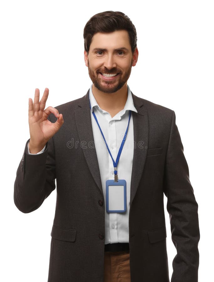 Smiling Man with VIP Pass Badge Showing OK Gesture on White Background ...