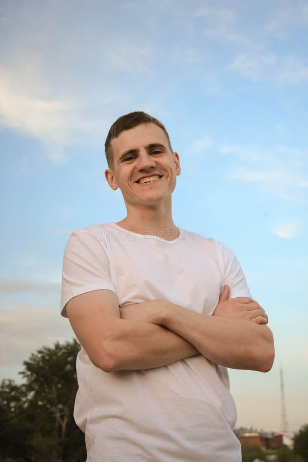 Smiling Man in White Clothes Stock Image - Image of caucasian, clothing ...