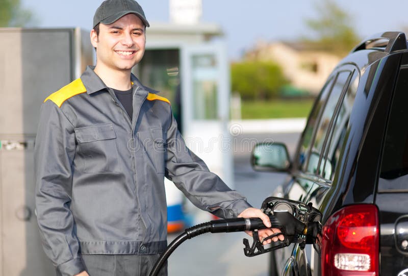 Man at Work at a Gas Station Stock Photo - Image of station, engine ...