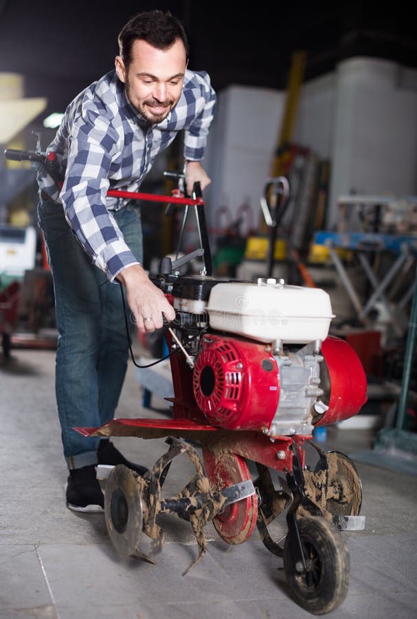 Worker Practicing His Skills with Plough at Workplace Stock Photo ...