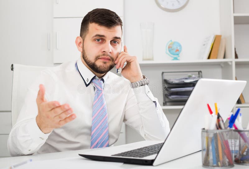 Man working productively stock photo. Image of routine - 220360170