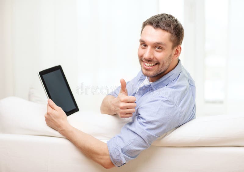 Smiling Man Working with Tablet Pc at Home Stock Image - Image of ...