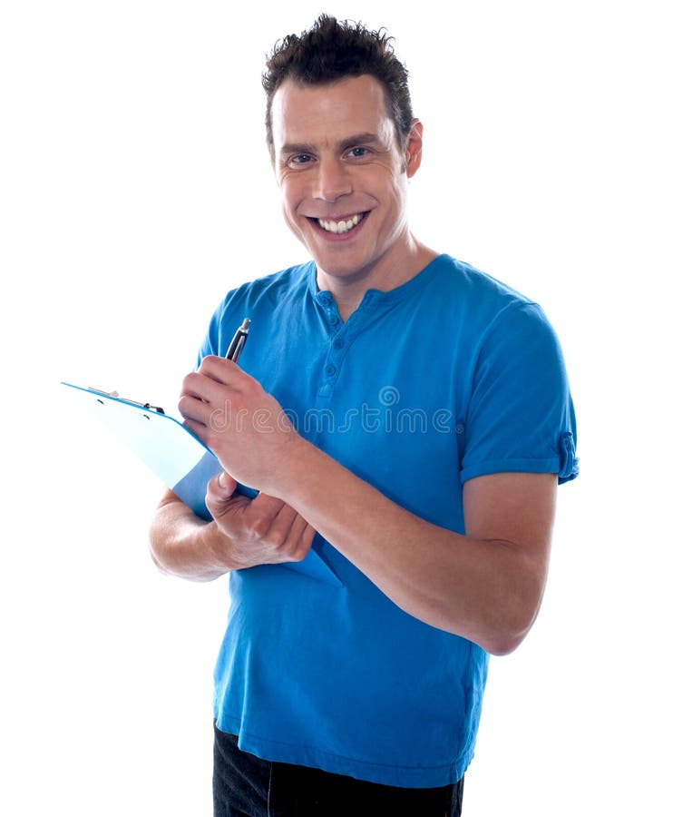 Smiling Man Writing on Clipboard Stock Image - Image of notes ...