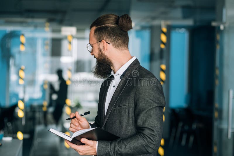 Smiling Man Writing daily Planner Business Agenda Stock Photo - Image ...