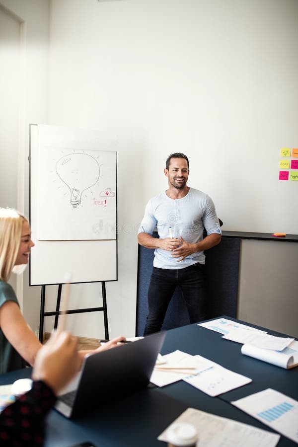 Manager Giving a Presentation To His Office Staff Stock Photo - Image ...