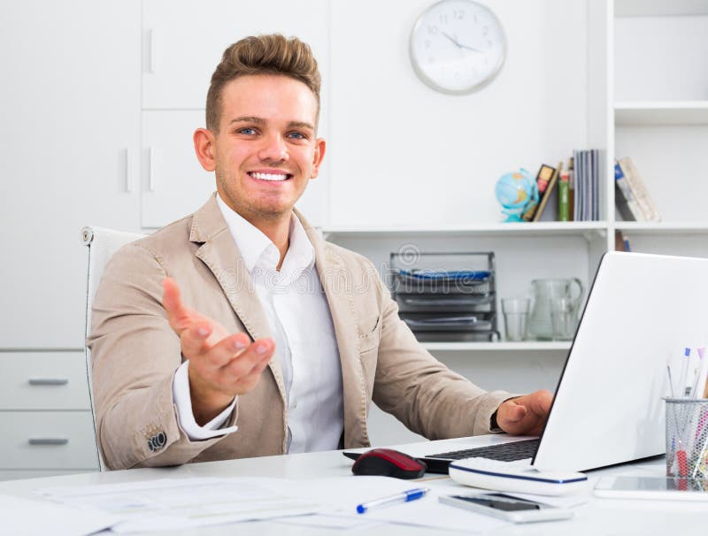 Smiling Manager at Office Desk with Laptop Stock Photo - Image of ...