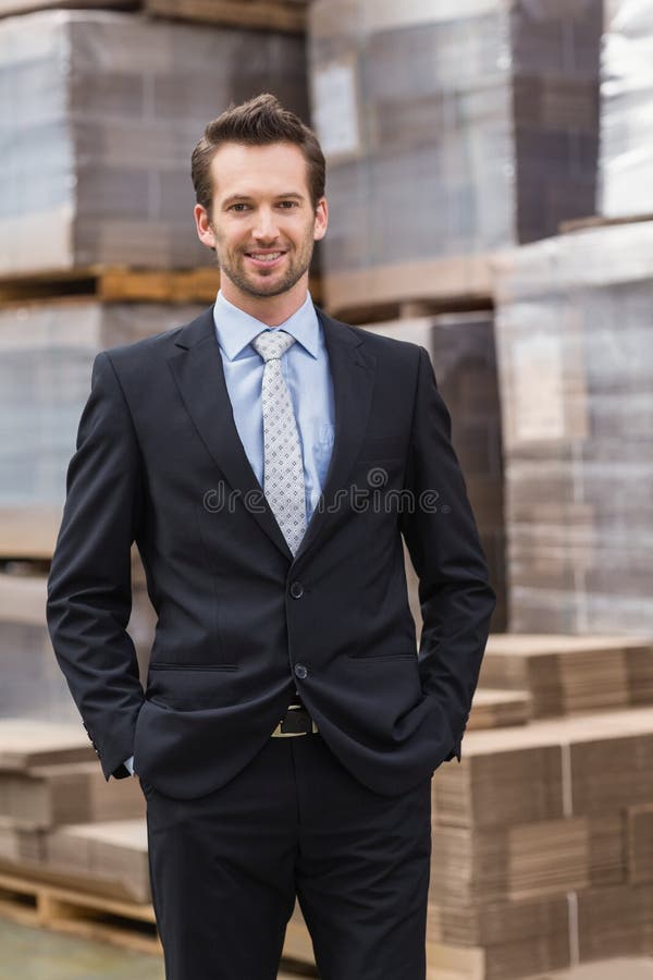 Smiling Manager in Suit Standing with Hands in Pockets Stock Image ...