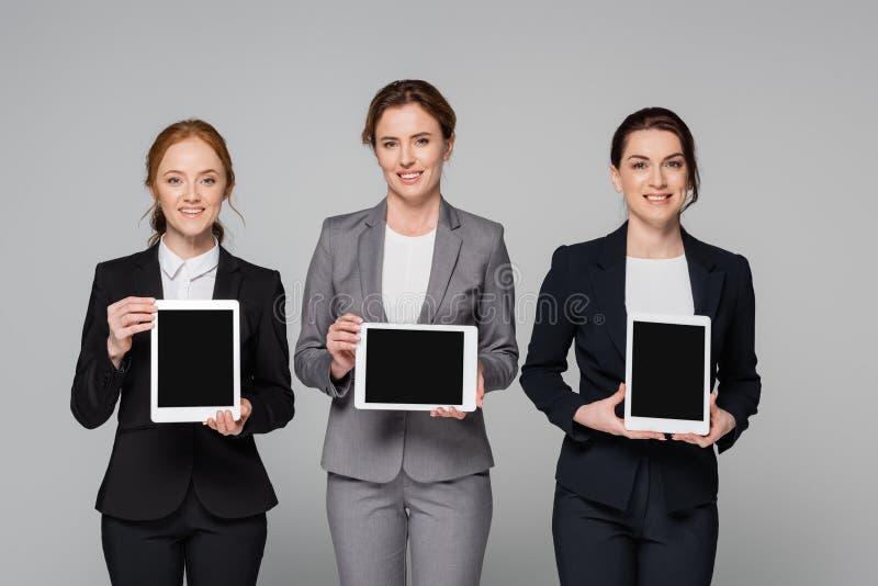 Smiling Managers Holding Digital Tablets Isolated Stock Image - Image ...