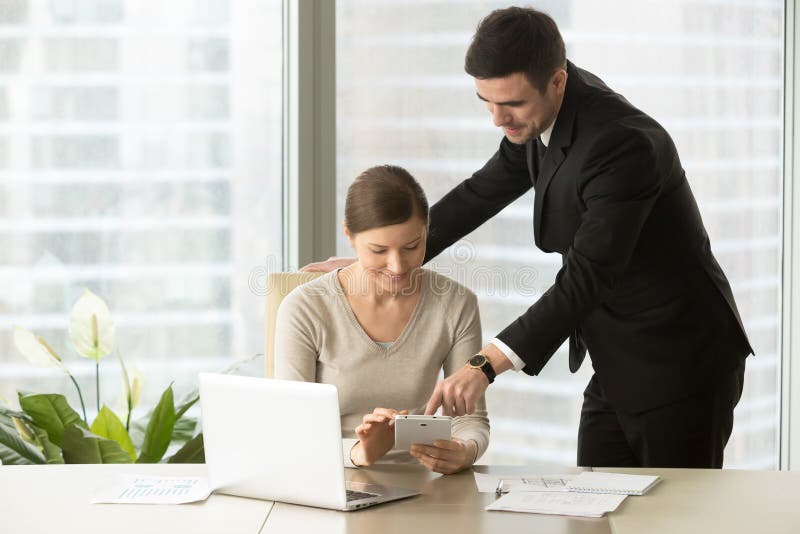 Smiling Managers Working on Tablet, Agents Using Real Estate App Stock ...