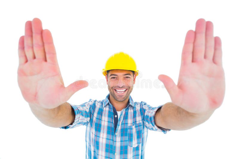 Smiling Manual Worker Gesturing Stop Sign Stock Photo - Image of manual ...