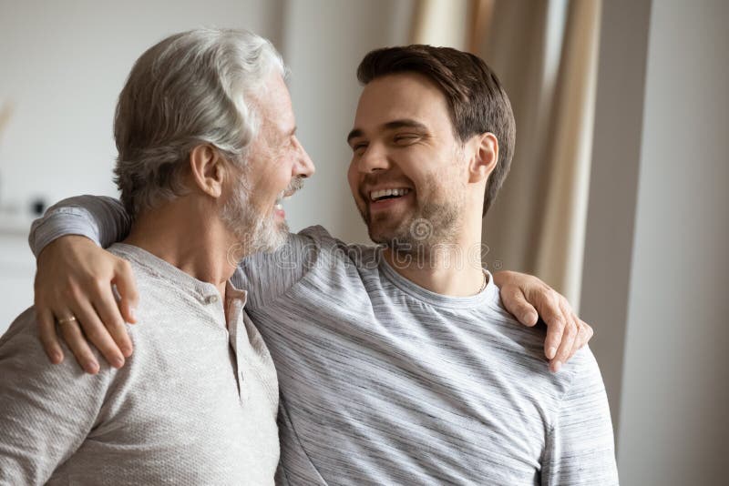 Smiling Mature Father And Adult Son Hugging Stock Image Image Of