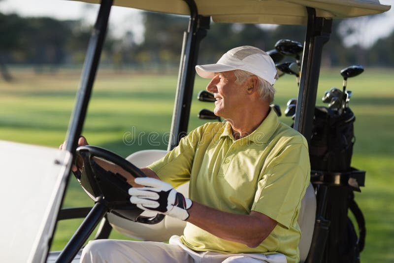 Smiling Mature Man Driving Golf Buggy Stock Image - Image of bright ...