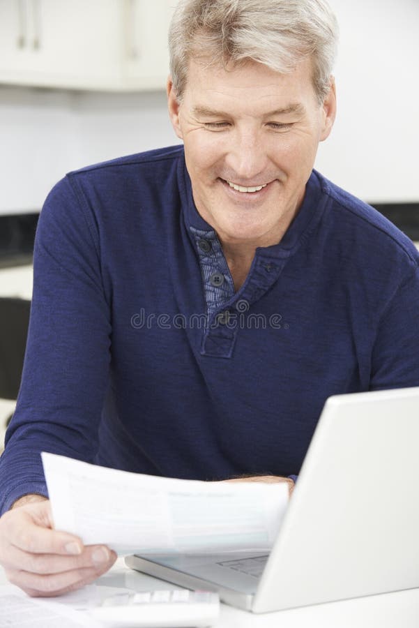 Smiling Mature Man Reviewing Domestic Finances Stock Image - Image of ...