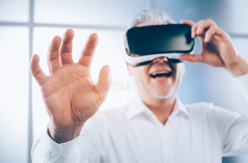 Man Interacting with Virtual Reality Stock Photo - Image of goggles ...
