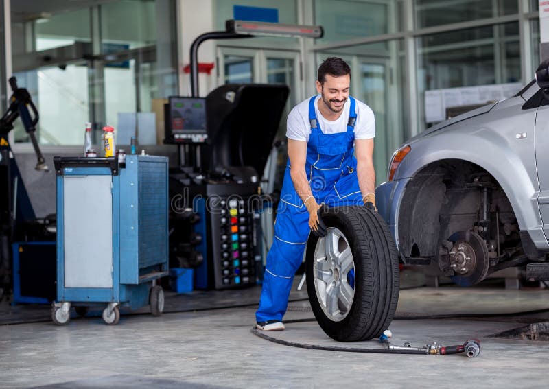 Smiling Mechanic with Tools Stock Image - Image of engine, profession ...