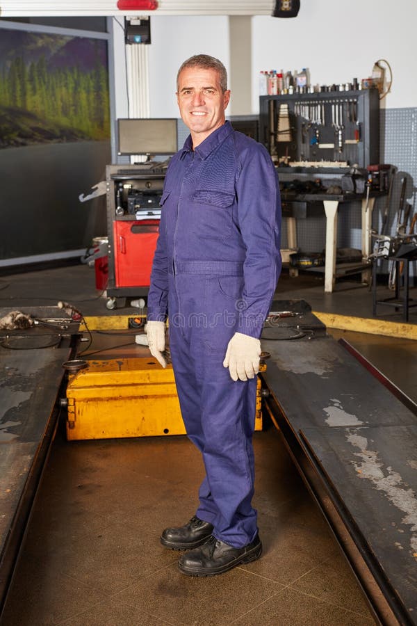 Smiling Mechatronics Engineer in Front of the Lift Stock Photo - Image ...