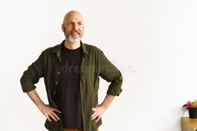 Smiling Mid-aged Bald Man with Silver Beard Standing Confidently in ...