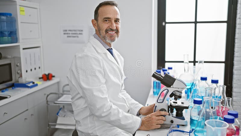 Smiling Middle Age Man with Grey Hair, Joyfully Embracing Science in ...