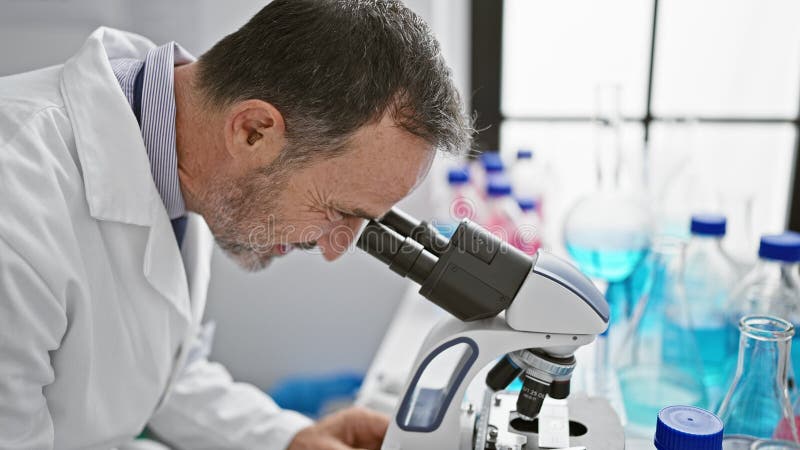 Smiling Middle Age Man with Grey Hair, Joyfully Embracing Science in ...