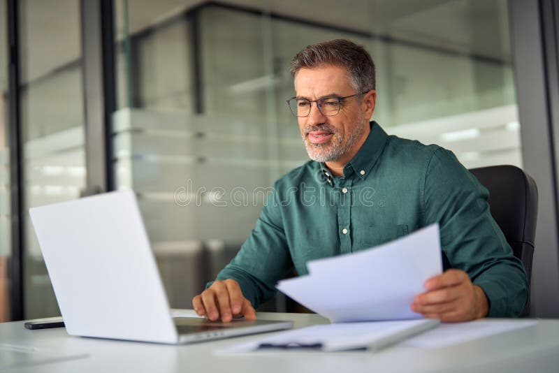 Smiling Middle Aged Business Man Investor Looking at Camera in Office ...