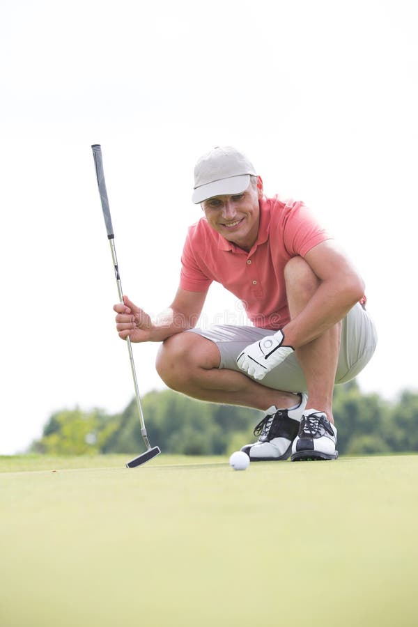 Smiling Middle Aged Man Looking Ball Crouching Golf Course Stock Photos ...