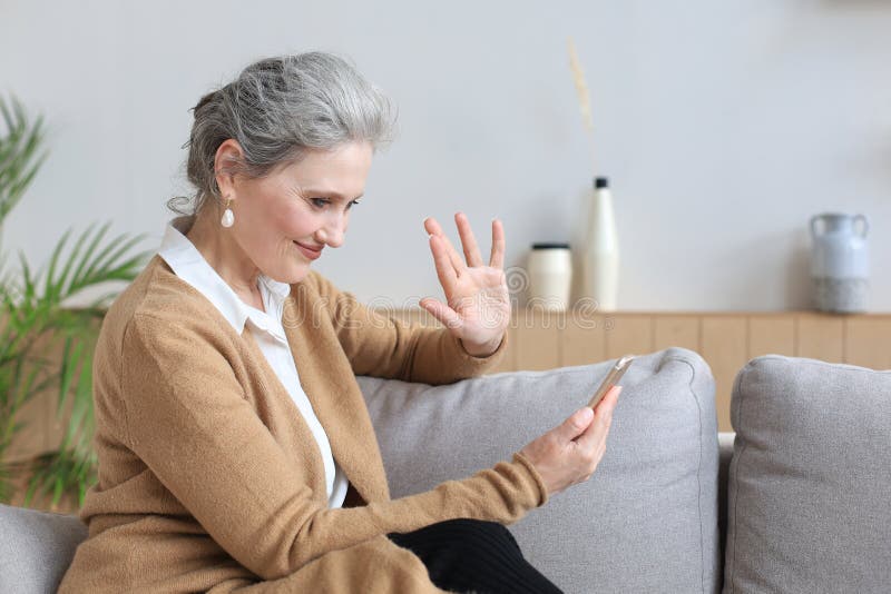 Smiling Middle Aged Woman Holding Phone, Using Mobile Device Apps ...