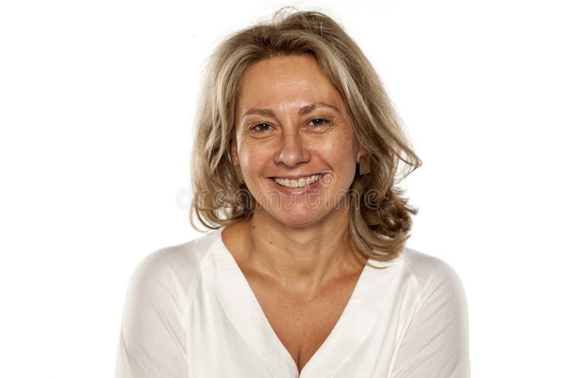 Friendly Smiling Middle-aged Woman on White Background Stock Photo ...