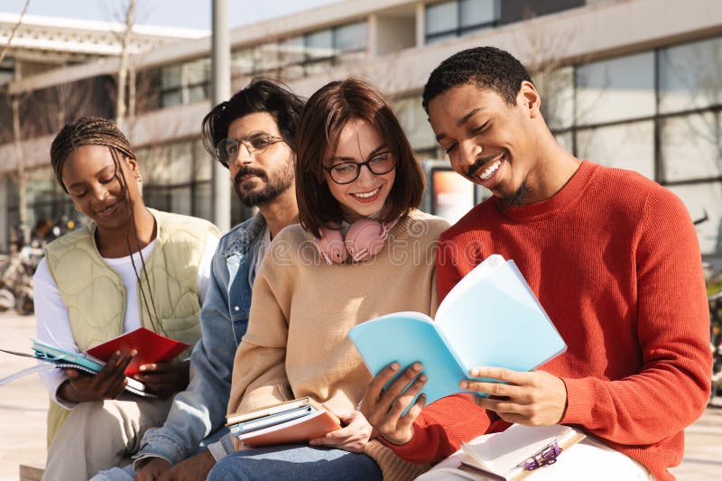 Smiling Millennial Different Modern Students Read Books, Study Together ...