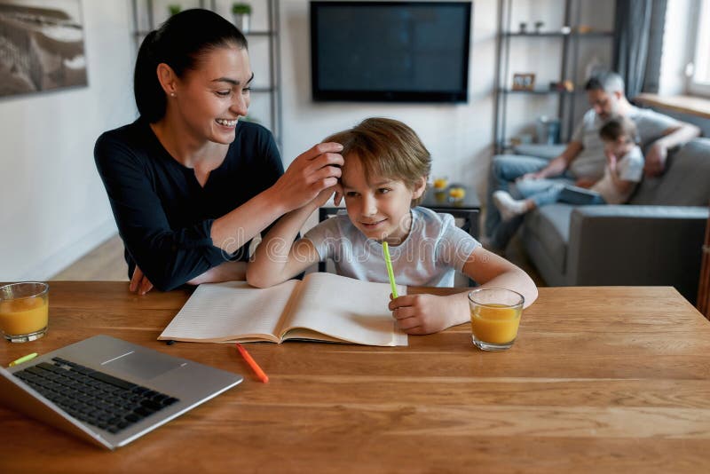 Smiling Mom Help Small Son with Homework Assignment Stock Image - Image ...