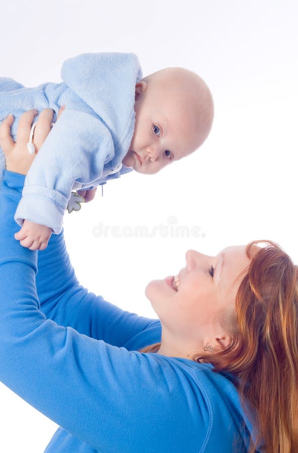 Smiling mother and baby stock image. Image of attractive - 13132411