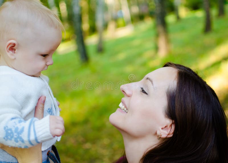 Smiling mother and baby stock image. Image of cheerful - 63121121
