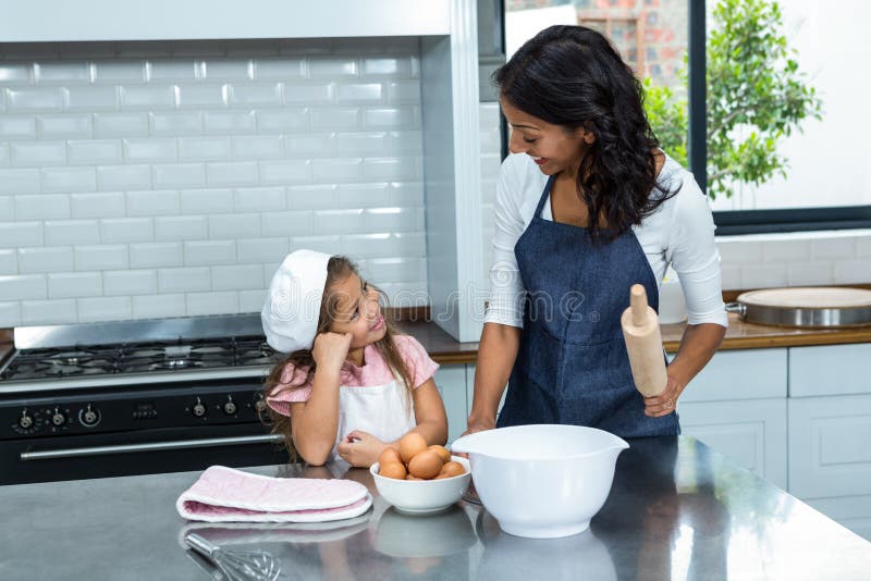 Smiling Mother and Daughter Ready To Cook in the Kitchen Stock Image ...
