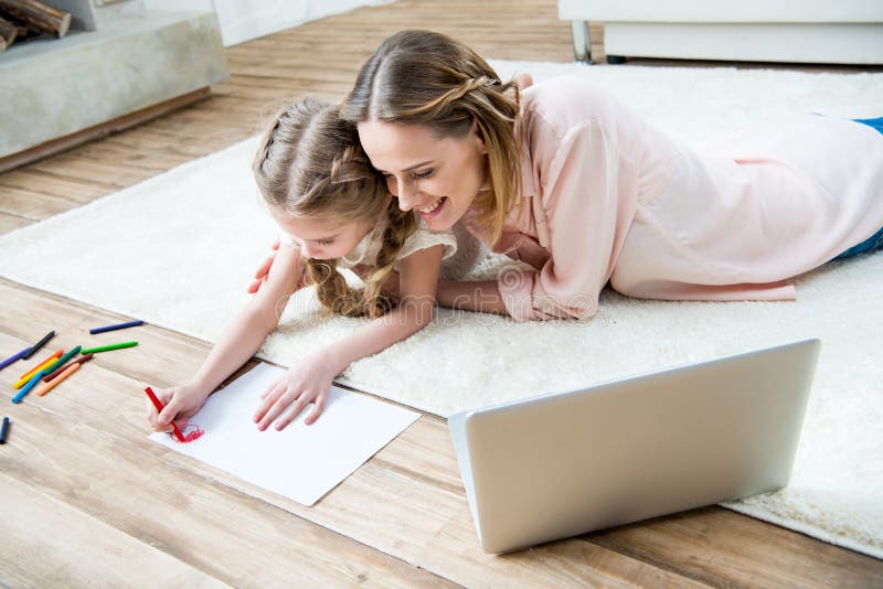 Smiling Mother Looking How Concentrated Daughter Drawing Stock Image ...