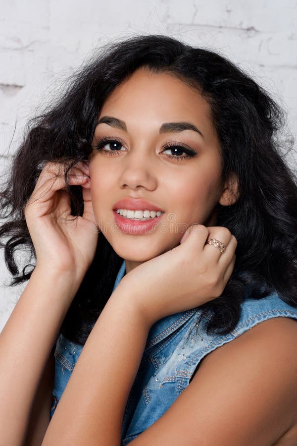 Smiling mulatto woman stock image. Image of portrait - 64678319