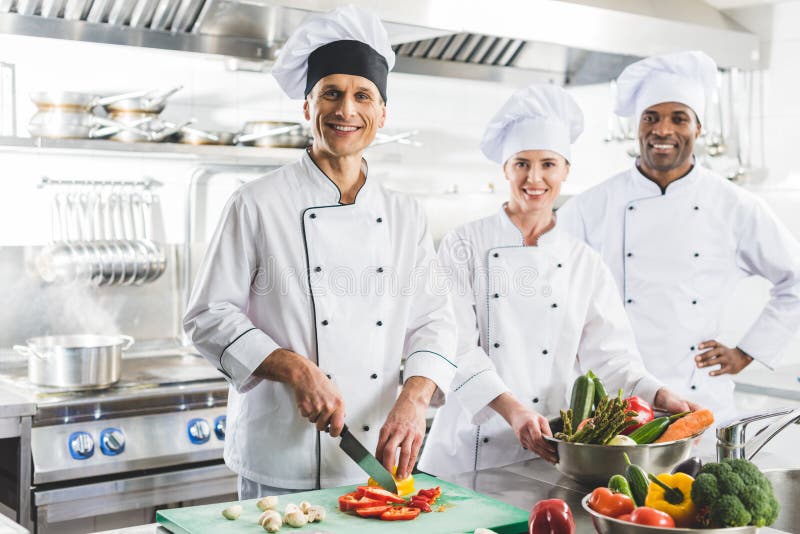 Smiling Multicultural Chefs Looking at Camera Stock Image - Image of ...