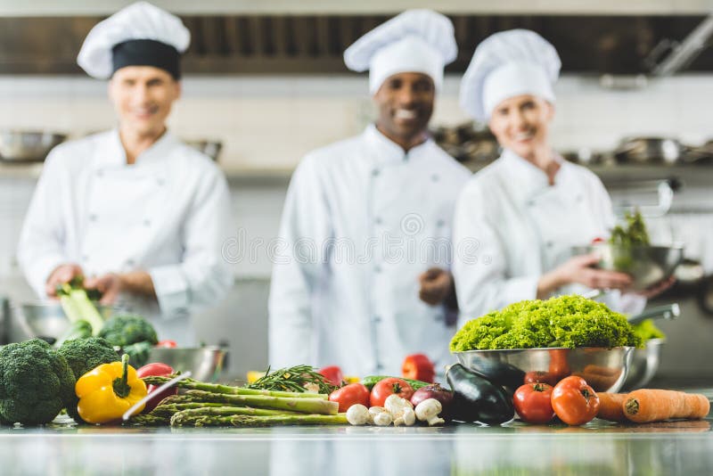 Smiling Multicultural Chefs Cooking Together Stock Image - Image of ...