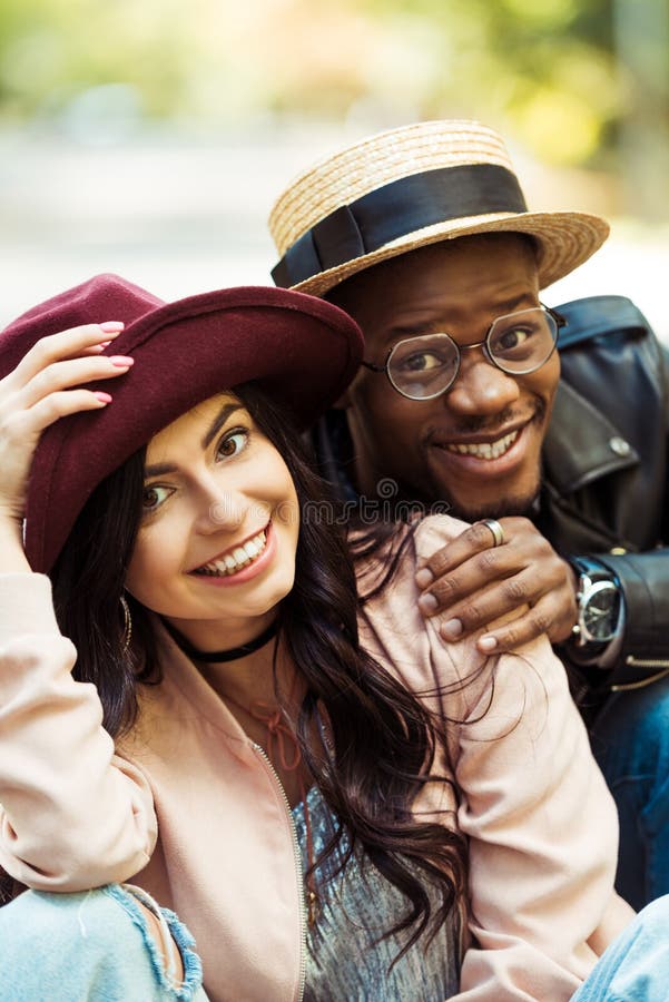 Smiling Multicultural Couple in Hats Stock Image - Image of casual ...
