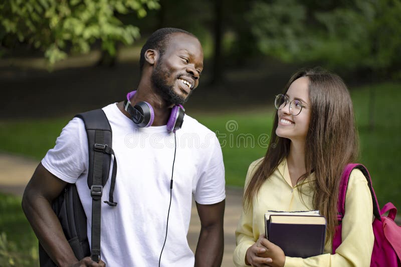 Smiling Multicultural Students Communicate Stock Photo - Image of ...