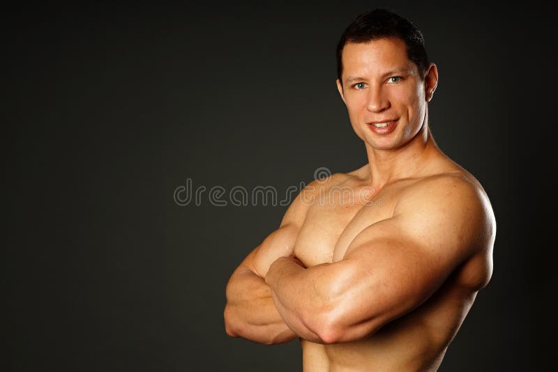 Smiling muscular man stock image. Image of male, success - 55790015
